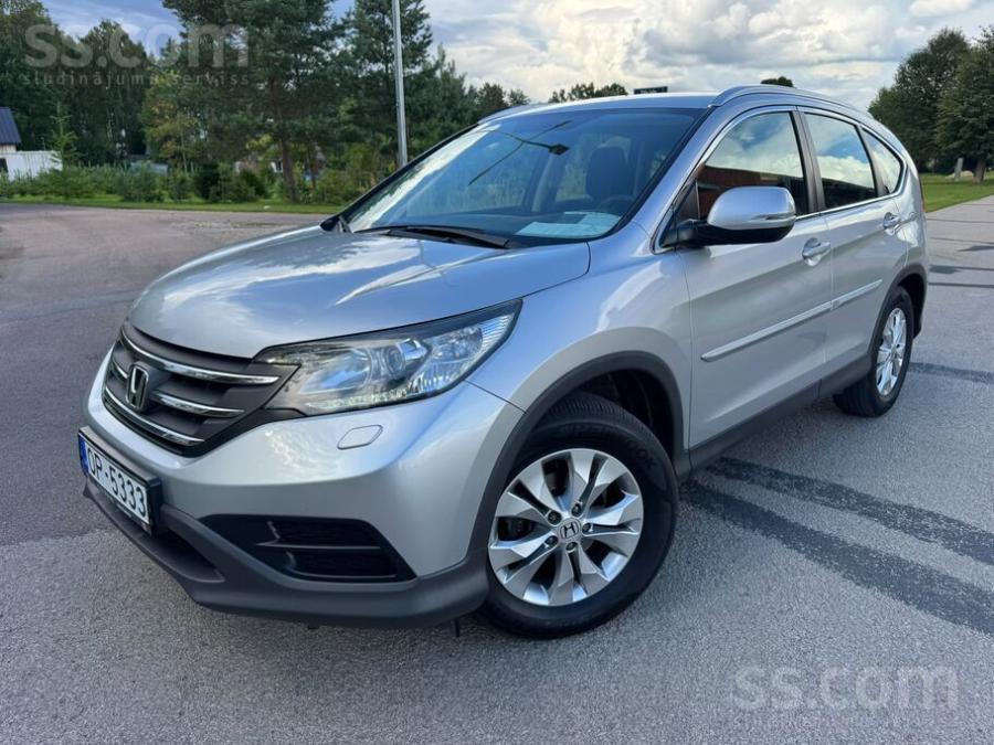 Grey Honda CR-V 2013 in Ogre, with an engine capacity of 2.00 L and mileage of 258 thousand km for 8550 €, photo 3 on AUTOMOTO.COM.LV