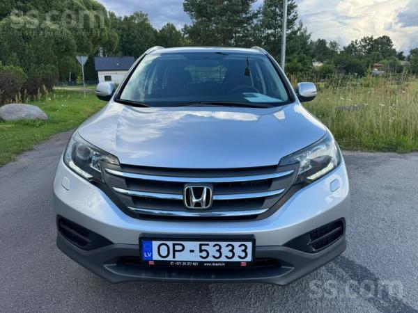 Grey Honda CR-V 2013 in Ogre, with an engine capacity of 2.00 L and mileage of 258 thousand km for 8550 €, photo 4 on AUTOMOTO.COM.LV