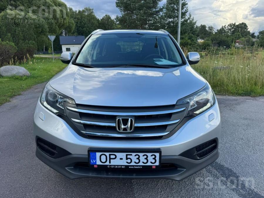 Grey Honda CR-V 2013 in Ogre, with an engine capacity of 2.00 L and mileage of 258 thousand km for 8550 €, photo 5 on AUTOMOTO.COM.LV
