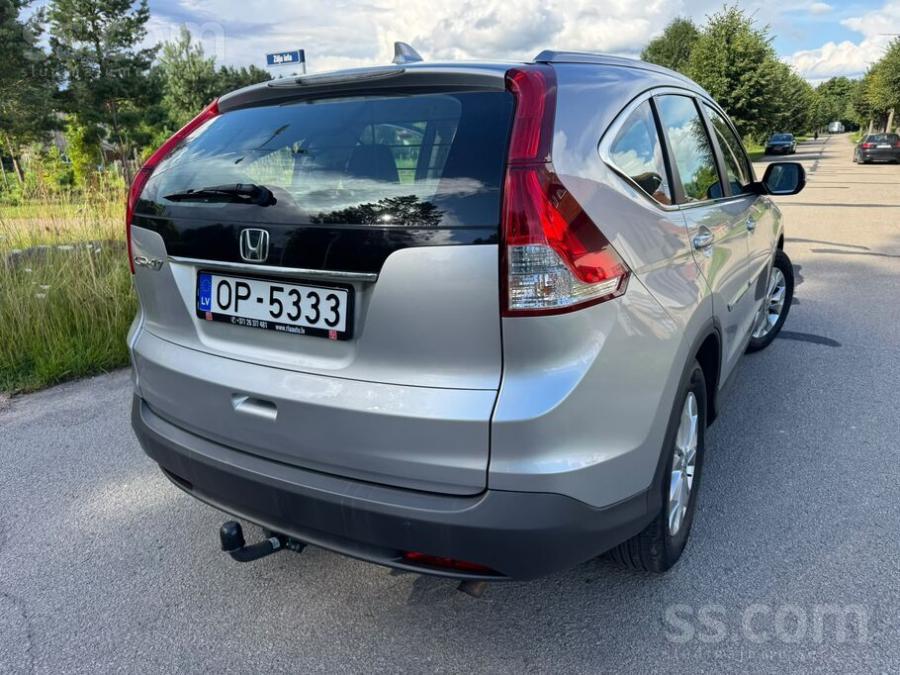 Grey Honda CR-V 2013 in Ogre, with an engine capacity of 2.00 L and mileage of 258 thousand km for 8550 €, photo 8 on AUTOMOTO.COM.LV