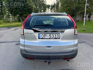 Grey Honda CR-V 2013 in Ogre, with an engine capacity of 2.00 L and mileage of 258 thousand km for 8550 €, photo 9 on AUTOMOTO.COM.LV