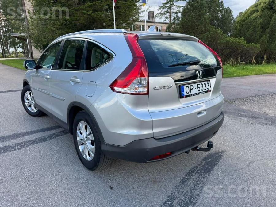 Grey Honda CR-V 2013 in Ogre, with an engine capacity of 2.00 L and mileage of 258 thousand km for 8550 €, photo 11 on AUTOMOTO.COM.LV
