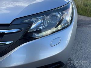 Grey Honda CR-V 2013 in Ogre, with an engine capacity of 2.00 L and mileage of 258 thousand km for 8550 €, photo 14 on AUTOMOTO.COM.LV