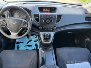 Grey Honda CR-V 2013 in Ogre, with an engine capacity of 2.00 L and mileage of 258 thousand km for 8550 €, photo 15 on AUTOMOTO.COM.LV