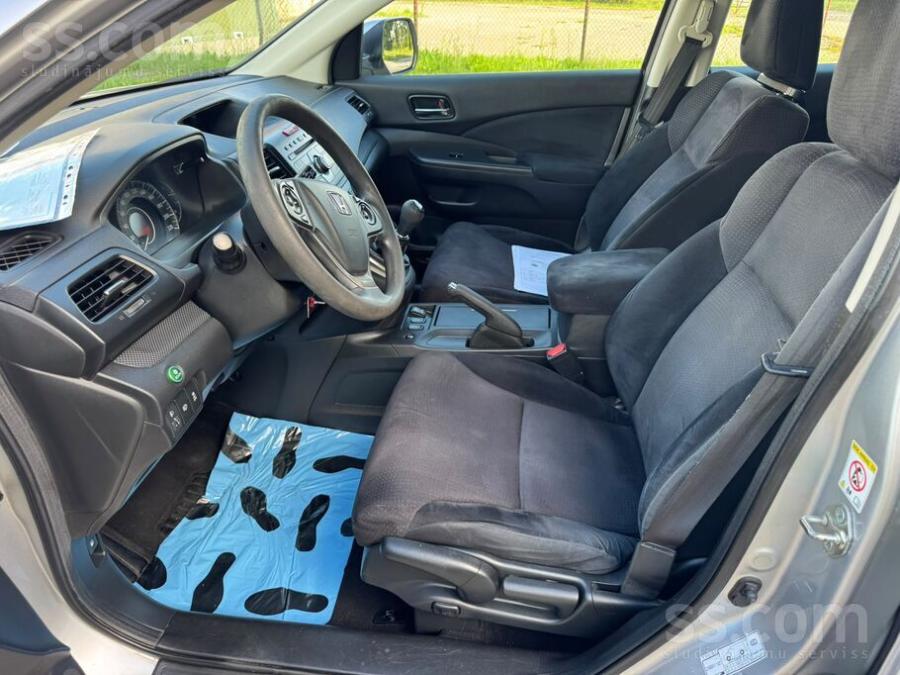 Grey Honda CR-V 2013 in Ogre, with an engine capacity of 2.00 L and mileage of 258 thousand km for 8550 €, photo 16 on AUTOMOTO.COM.LV