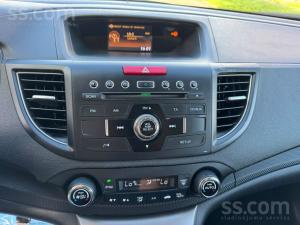 Grey Honda CR-V 2013 in Ogre, with an engine capacity of 2.00 L and mileage of 258 thousand km for 8550 €, photo 19 on AUTOMOTO.COM.LV