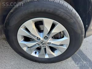 Grey Honda CR-V 2013 in Ogre, with an engine capacity of 2.00 L and mileage of 258 thousand km for 8550 €, photo 25 on AUTOMOTO.COM.LV