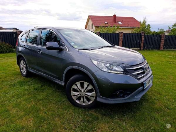 Grey Honda CR-V 2013 in Vievis, with an engine capacity of 1.60 L and mileage of 227 thousand km for 7000 €, photo 3 on AUTOMOTO.COM.LV