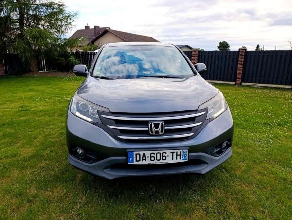 Grey Honda CR-V 2013 in Vievis, with an engine capacity of 1.60 L and mileage of 227 thousand km for 7000 €, photo 4 on AUTOMOTO.COM.LV