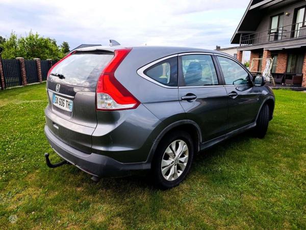 Grey Honda CR-V 2013 in Vievis, with an engine capacity of 1.60 L and mileage of 227 thousand km for 7000 €, photo 7 on AUTOMOTO.COM.LV