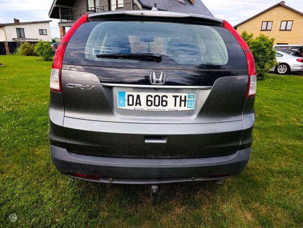 Grey Honda CR-V 2013 in Vievis, with an engine capacity of 1.60 L and mileage of 227 thousand km for 7000 €, photo 8 on AUTOMOTO.COM.LV