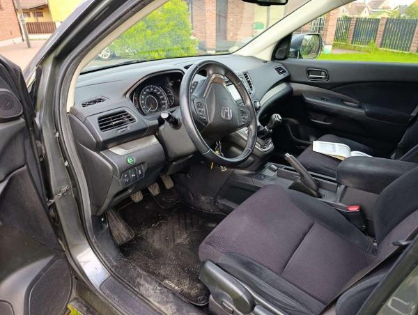 Grey Honda CR-V 2013 in Vievis, with an engine capacity of 1.60 L and mileage of 227 thousand km for 7000 €, photo 10 on AUTOMOTO.COM.LV