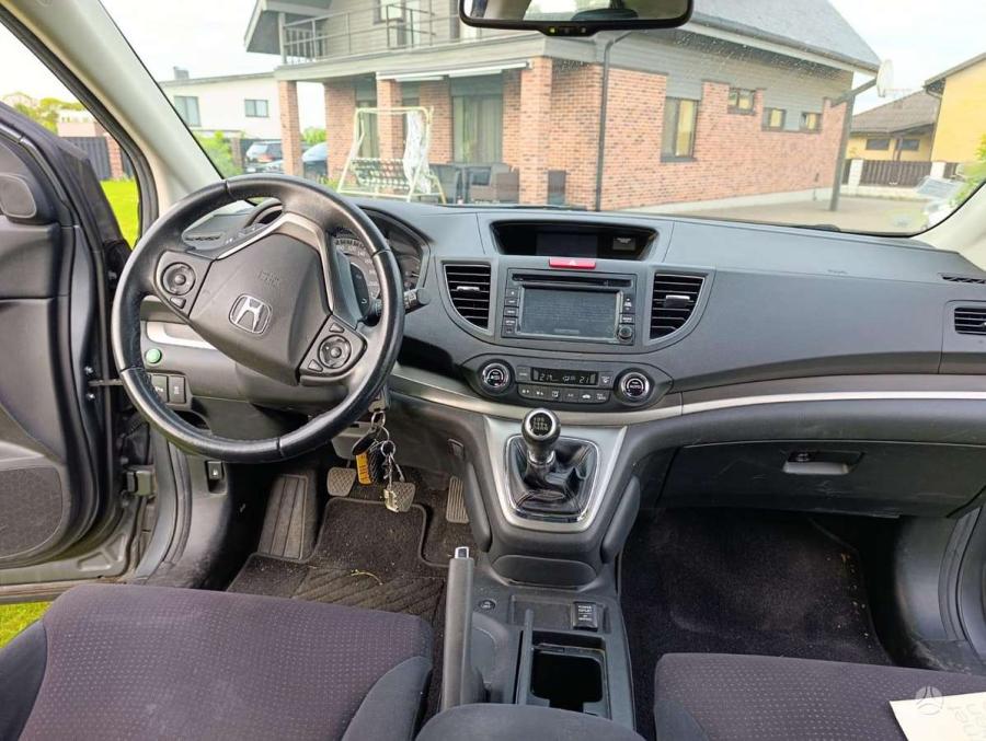 Pelēks Honda CR-V 2013 Vievis, ar dzinēja tilpumu 1.60 L un nobraukumu 227 tūkst. km par 7000 €, foto 16 vietnē AUTOMOTO.COM.LV