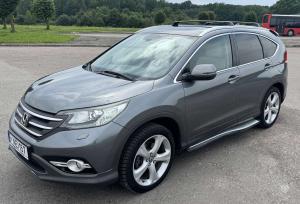 Grey Honda CR-V 2013 in Kaunas, with an engine capacity of 2.20 L and mileage of 218 thousand km for 12799 €, photo  on AUTOMOTO.COM.LV