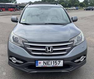 Grey Honda CR-V 2013 in Kaunas, with an engine capacity of 2.20 L and mileage of 218 thousand km for 12799 €, photo 3 on AUTOMOTO.COM.LV