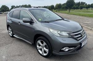Grey Honda CR-V 2013 in Kaunas, with an engine capacity of 2.20 L and mileage of 218 thousand km for 12799 €, photo 4 on AUTOMOTO.COM.LV