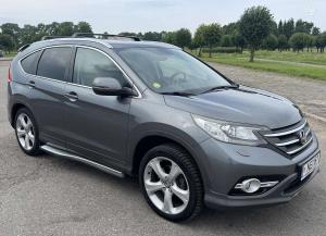 Grey Honda CR-V 2013 in Kaunas, with an engine capacity of 2.20 L and mileage of 218 thousand km for 12799 €, photo 5 on AUTOMOTO.COM.LV