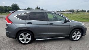 Grey Honda CR-V 2013 in Kaunas, with an engine capacity of 2.20 L and mileage of 218 thousand km for 12799 €, photo 6 on AUTOMOTO.COM.LV