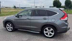 Grey Honda CR-V 2013 in Kaunas, with an engine capacity of 2.20 L and mileage of 218 thousand km for 12799 €, photo 7 on AUTOMOTO.COM.LV