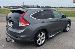 Grey Honda CR-V 2013 in Kaunas, with an engine capacity of 2.20 L and mileage of 218 thousand km for 12799 €, photo 9 on AUTOMOTO.COM.LV