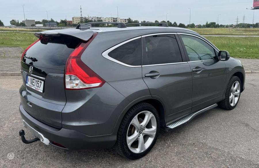 Grey Honda CR-V 2013 in Kaunas, with an engine capacity of 2.20 L and mileage of 218 thousand km for 12799 €, photo 9 on AUTOMOTO.COM.LV