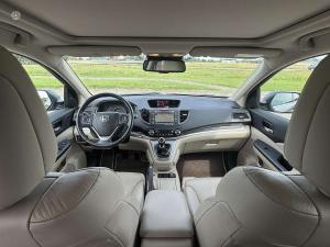 Grey Honda CR-V 2013 in Kaunas, with an engine capacity of 2.20 L and mileage of 218 thousand km for 12799 €, photo 17 on AUTOMOTO.COM.LV