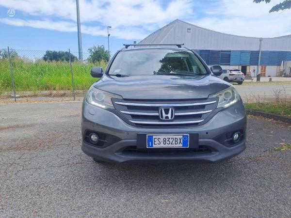 Grey Honda CR-V 2013 in Kaunas, with an engine capacity of 2.00 L and mileage of 255 thousand km for 6800 €, photo 1 on AUTOMOTO.COM.LV