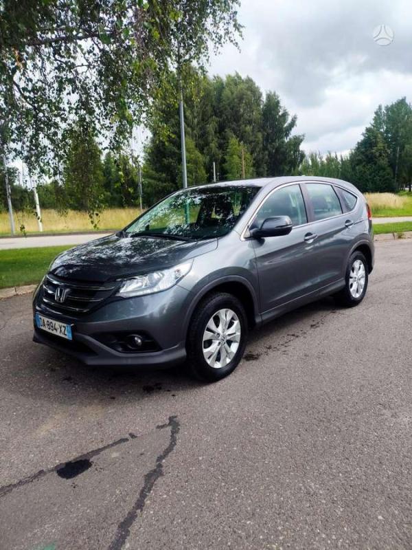 Grey Honda CR-V 2013 in Taurage, with an engine capacity of 1.60 L and mileage of 176 thousand km for 8600 €, photo 2 on AUTOMOTO.COM.LV