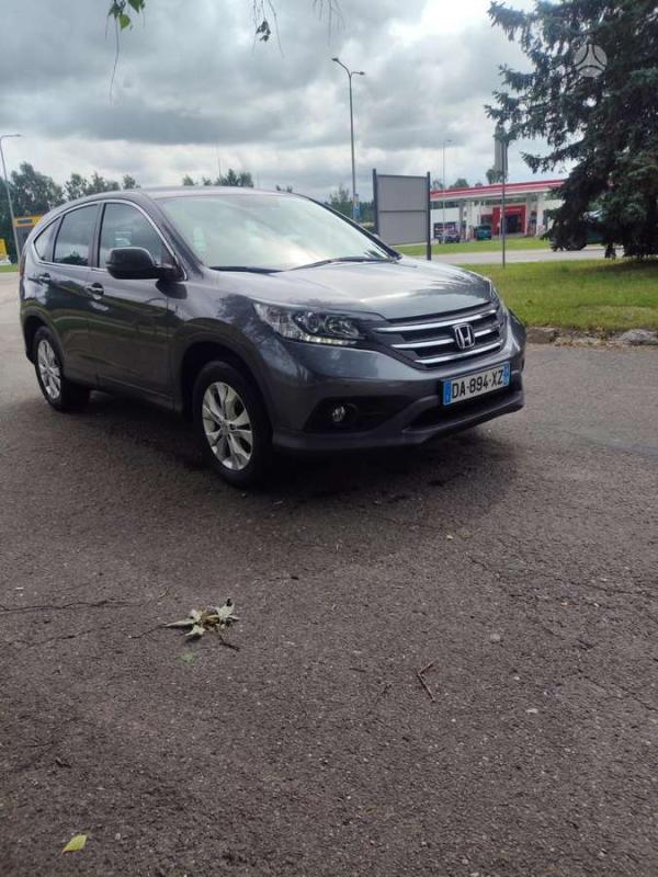 Grey Honda CR-V 2013 in Taurage, with an engine capacity of 1.60 L and mileage of 176 thousand km for 8600 €, photo 3 on AUTOMOTO.COM.LV