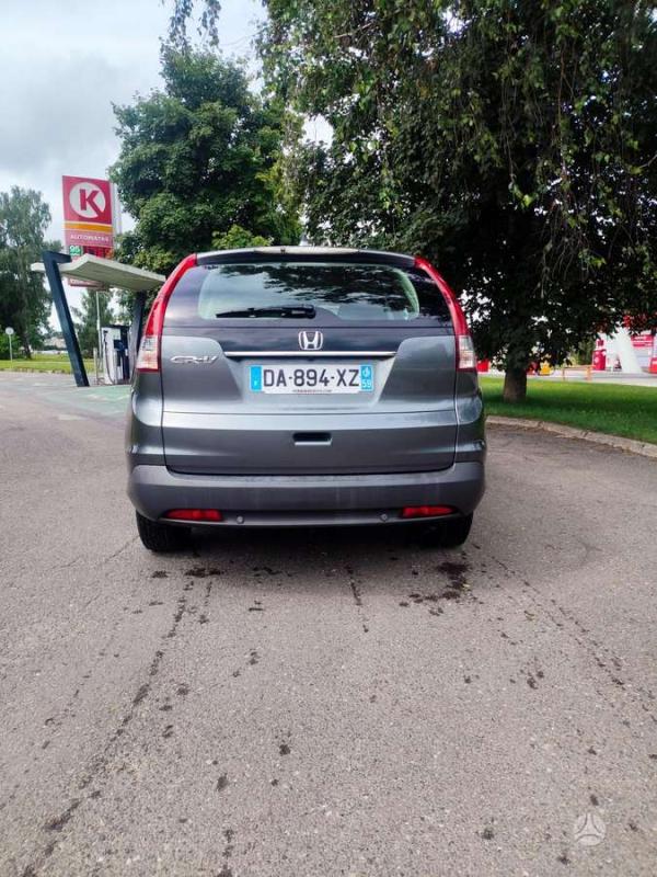 Grey Honda CR-V 2013 in Taurage, with an engine capacity of 1.60 L and mileage of 176 thousand km for 8600 €, photo 4 on AUTOMOTO.COM.LV