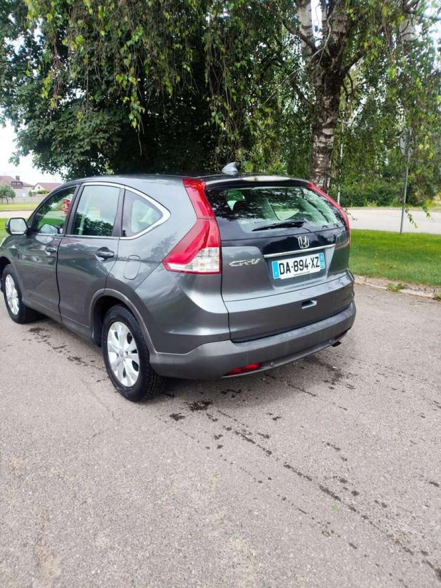 Pelēks Honda CR-V 2013 Tauragė, ar dzinēja tilpumu 1.60 L un nobraukumu 176 tūkst. km par 8600 €, foto 6 vietnē AUTOMOTO.COM.LV