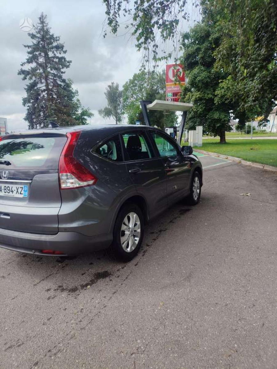 Pelēks Honda CR-V 2013 Tauragė, ar dzinēja tilpumu 1.60 L un nobraukumu 176 tūkst. km par 8600 €, foto 7 vietnē AUTOMOTO.COM.LV