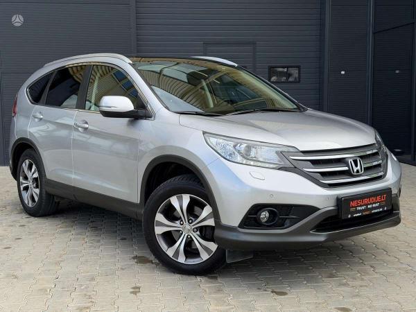 Pelēks Honda CR-V 2013 Viļņa, ar dzinēja tilpumu 2.20 L un nobraukumu 220 tūkst. km par 12999 €, foto 6 vietnē AUTOMOTO.COM.LV
