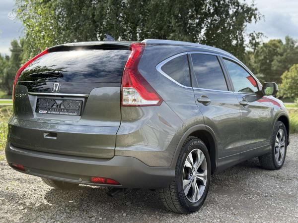 Grey Honda CR-V 2013 in Siauliai, with an engine capacity of 2.20 L and mileage of 284 thousand km for 12999 €, photo 9 on AUTOMOTO.COM.LV