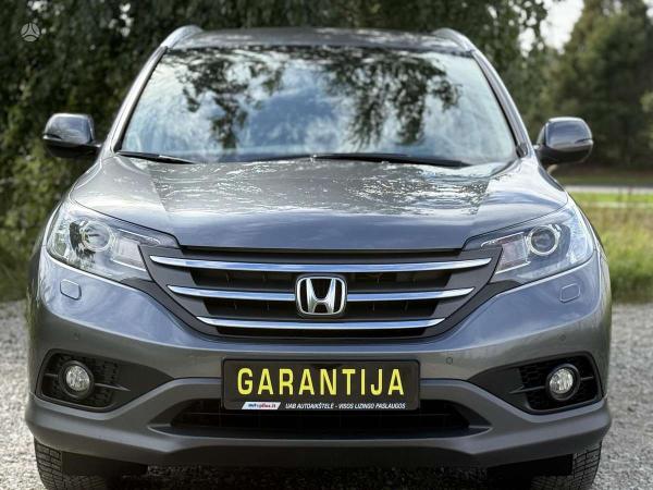Grey Honda CR-V 2013 in Siauliai, with an engine capacity of 2.20 L and mileage of 284 thousand km for 12999 €, photo 10 on AUTOMOTO.COM.LV