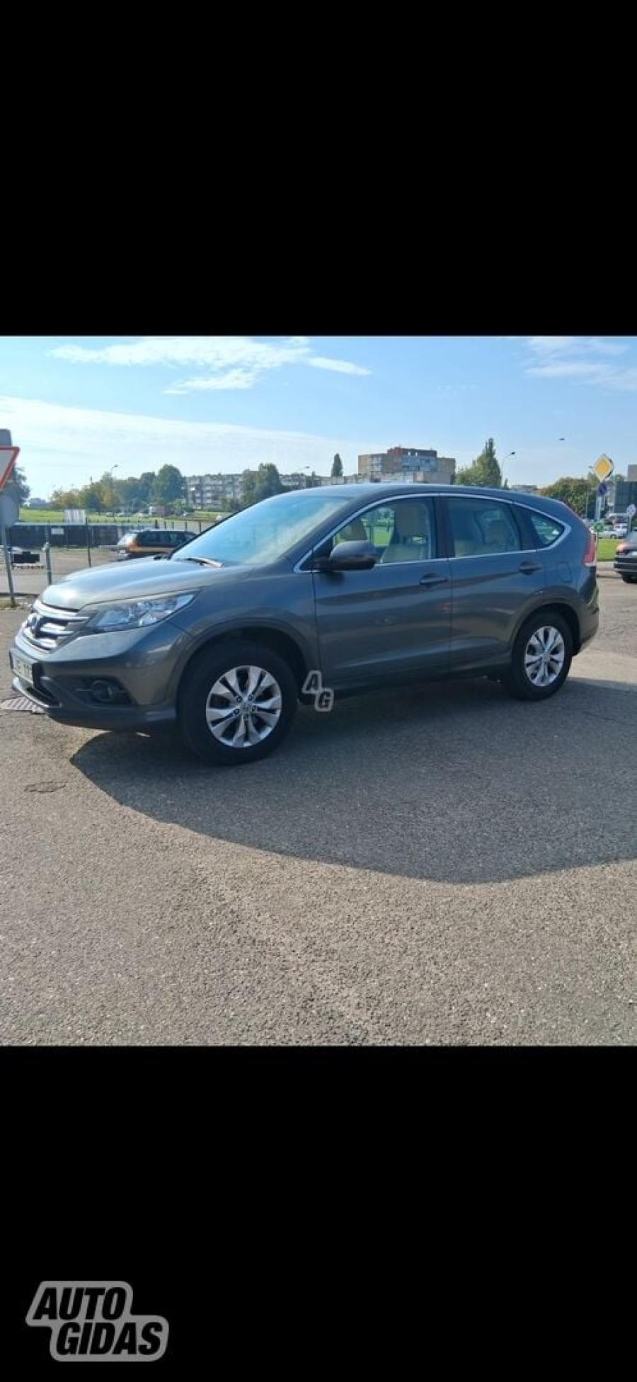 Grey Honda CR-V 2013 in Klaipeda, with an engine capacity of 2.20 L and mileage of 207 thousand km for 8499 €, photo 1 on AUTOMOTO.COM.LV