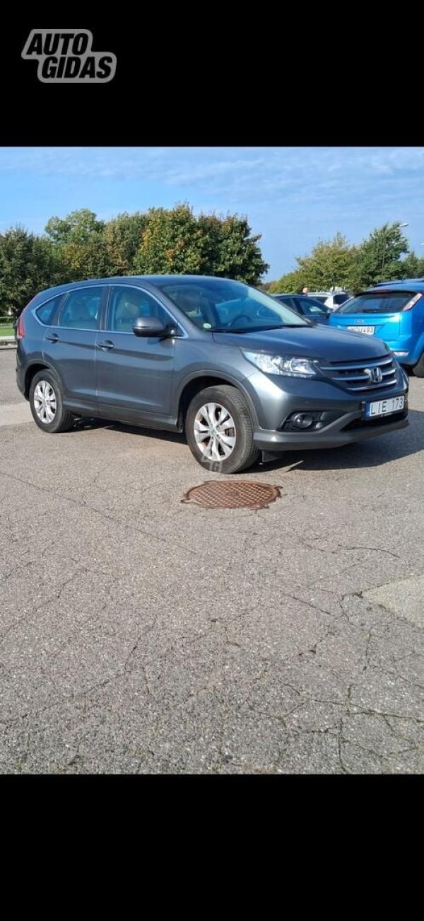 Grey Honda CR-V 2013 in Klaipeda, with an engine capacity of 2.20 L and mileage of 207 thousand km for 8499 €, photo 4 on AUTOMOTO.COM.LV