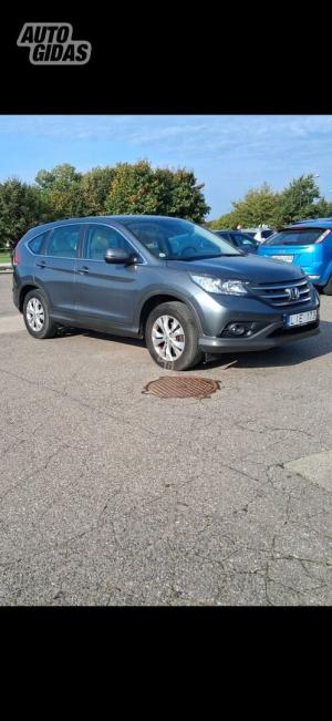 Grey Honda CR-V 2013 in Klaipeda, with an engine capacity of 2.20 L and mileage of 207 thousand km for 8499 €, photo 4 on AUTOMOTO.COM.LV