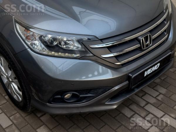 Grey Honda CR-V 2014 in Riga, with an engine capacity of 2.00 L and mileage of 189 thousand km for 4200 €, photo 3 on AUTOMOTO.COM.LV