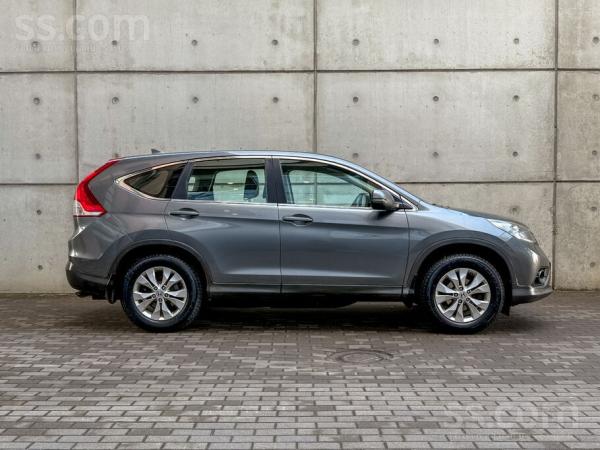 Grey Honda CR-V 2014 in Riga, with an engine capacity of 2.00 L and mileage of 189 thousand km for 4200 €, photo 4 on AUTOMOTO.COM.LV