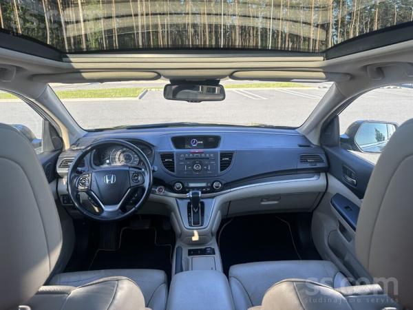 Grey Honda CR-V 2014 in Riga, with an engine capacity of 2.20 L and mileage of 184 thousand km for 10700 €, photo 5 on AUTOMOTO.COM.LV