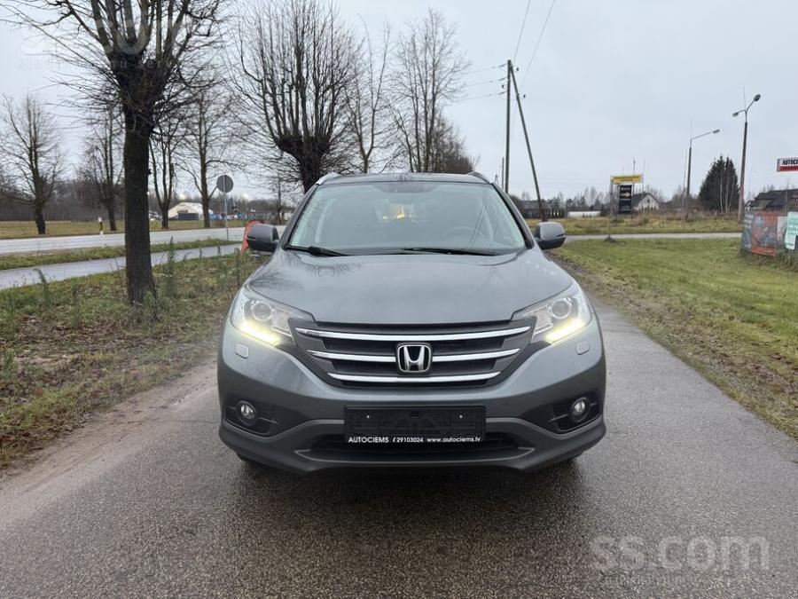 Pelēks Honda CR-V 2014 Ogre, ar dzinēja tilpumu 2.20 L un nobraukumu 241 tūkst. km par 13799 €, foto 2 vietnē AUTOMOTO.COM.LV