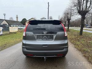 Pelēks Honda CR-V 2014 Ogre, ar dzinēja tilpumu 2.20 L un nobraukumu 241 tūkst. km par 13799 €, foto 7 vietnē AUTOMOTO.COM.LV