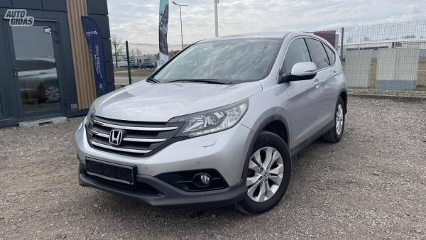Grey Honda CR-V 2014 in Marijampole, with an engine capacity of 1.60 L and mileage of 220 thousand km for 8790 €, photo 1 on AUTOMOTO.COM.LV