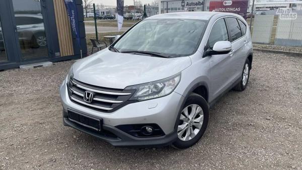 Grey Honda CR-V 2014 in Marijampole, with an engine capacity of 1.60 L and mileage of 220 thousand km for 8790 €, photo 2 on AUTOMOTO.COM.LV