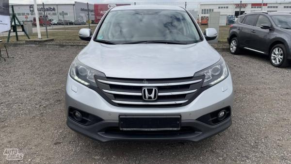 Grey Honda CR-V 2014 in Marijampole, with an engine capacity of 1.60 L and mileage of 220 thousand km for 8790 €, photo 3 on AUTOMOTO.COM.LV