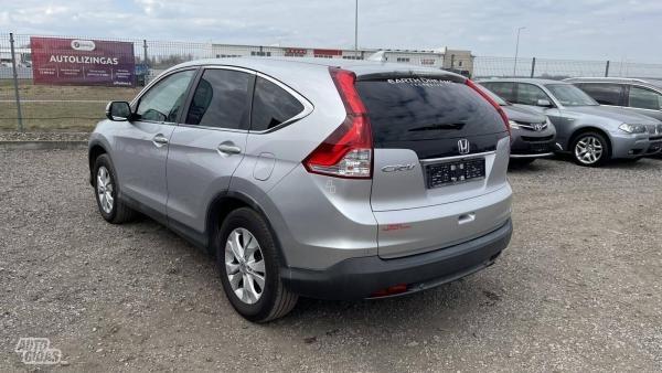 Grey Honda CR-V 2014 in Marijampole, with an engine capacity of 1.60 L and mileage of 220 thousand km for 8790 €, photo 5 on AUTOMOTO.COM.LV