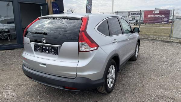 Grey Honda CR-V 2014 in Marijampole, with an engine capacity of 1.60 L and mileage of 220 thousand km for 8790 €, photo 7 on AUTOMOTO.COM.LV