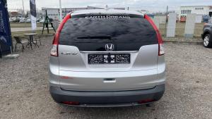 Grey Honda CR-V 2014 in Marijampole, with an engine capacity of 1.60 L and mileage of 220 thousand km for 8790 €, photo 7 on AUTOMOTO.COM.LV