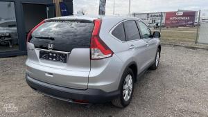 Grey Honda CR-V 2014 in Marijampole, with an engine capacity of 1.60 L and mileage of 220 thousand km for 8790 €, photo 8 on AUTOMOTO.COM.LV